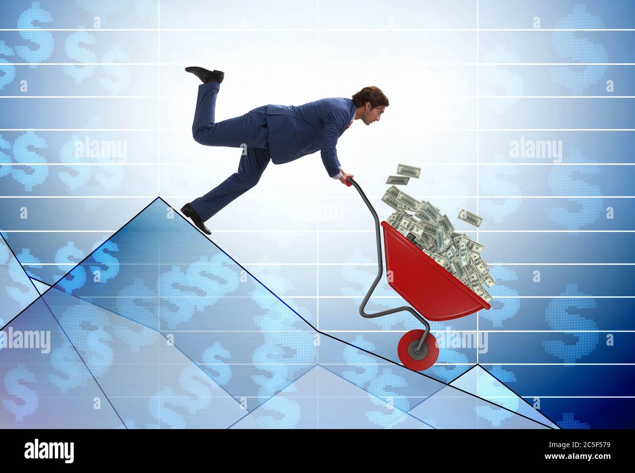 The businessman pushing money wheelbarrow down the chart Stock Photo ...