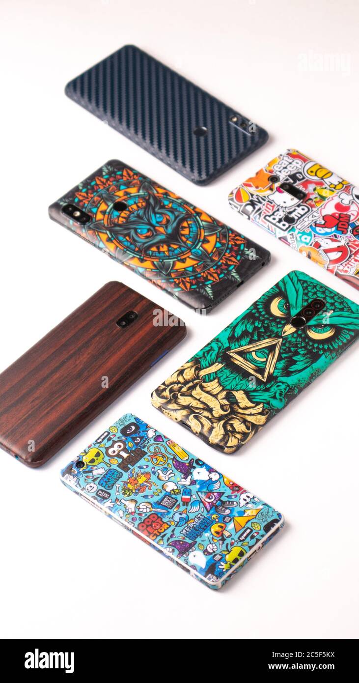 custom phone skin flatlay with different background colour Stock Photo ...