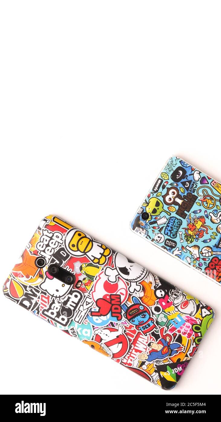 custom phone skin flatlay with different background colour Stock Photo ...