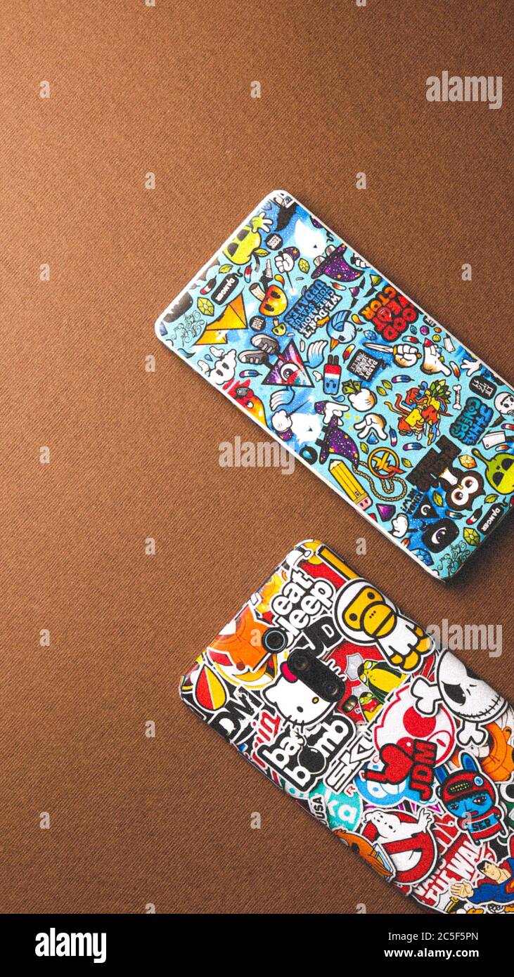 custom phone skin flatlay with different background colour Stock Photo ...