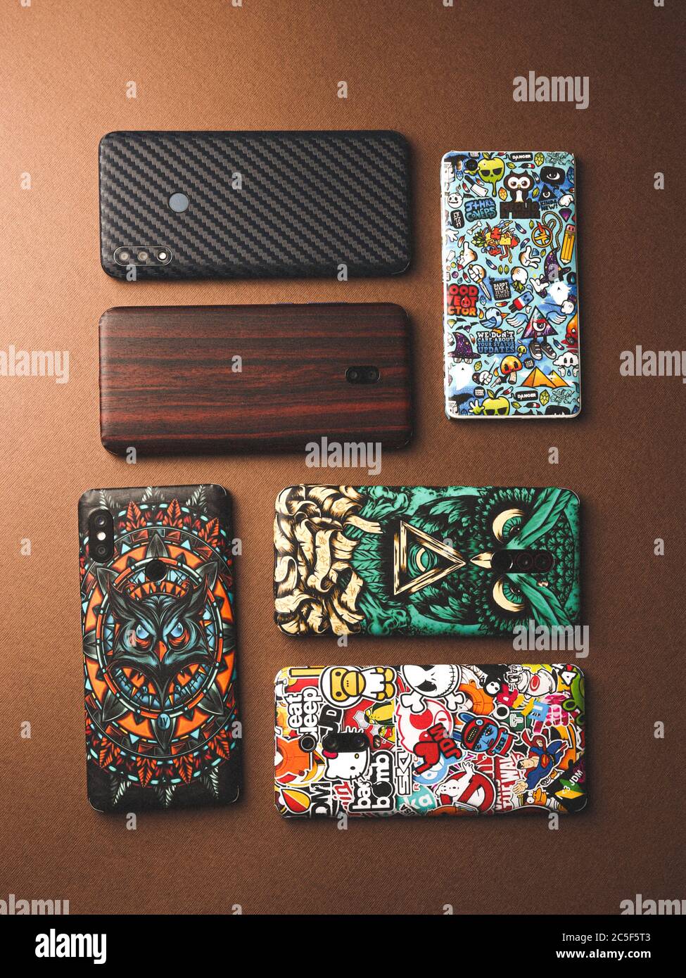 custom phone skin flatlay with different background colour Stock Photo ...