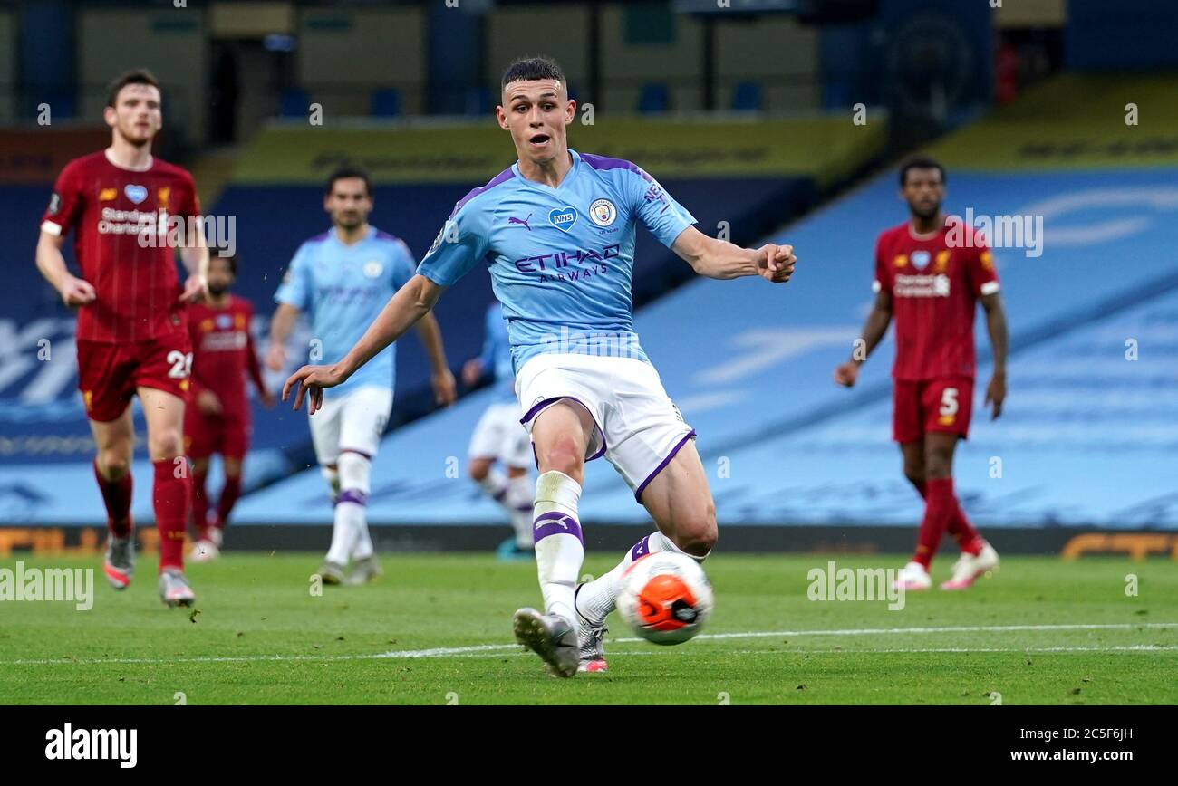Manchester City's Phil Foden scores his side's third goal of the game ...