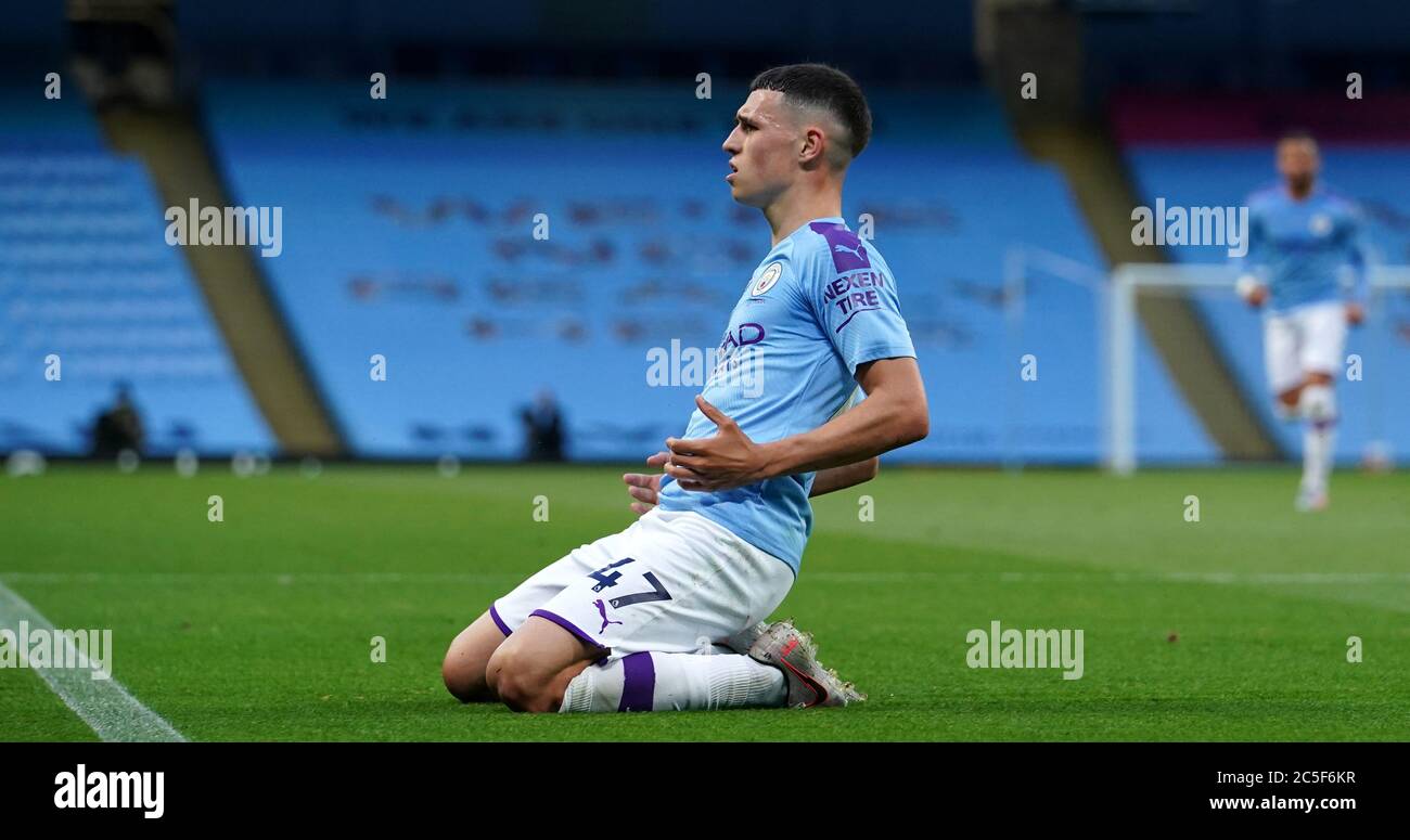 Manchester City's Phil Foden celebrates scoring his side's third goal ...