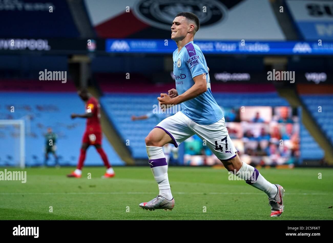 Manchester City's Phil Foden celebrates scoring his side's third goal ...