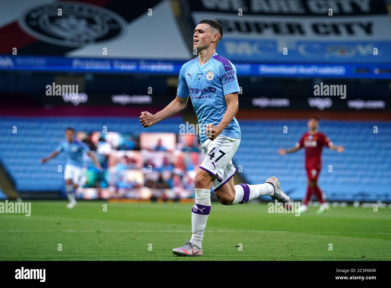 Manchester City's Phil Foden celebrates scoring his side's third goal ...