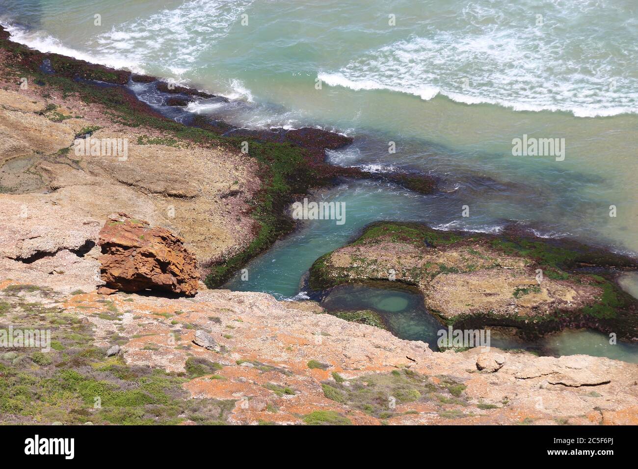 Cliffs and the Indian Ocean in Robberg Nature Reserve, a world heritage ...