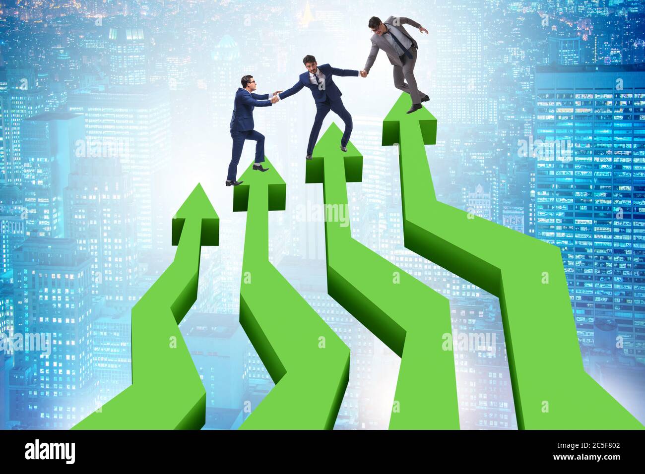 Colleagues helping each other to improve the results Stock Photo - Alamy