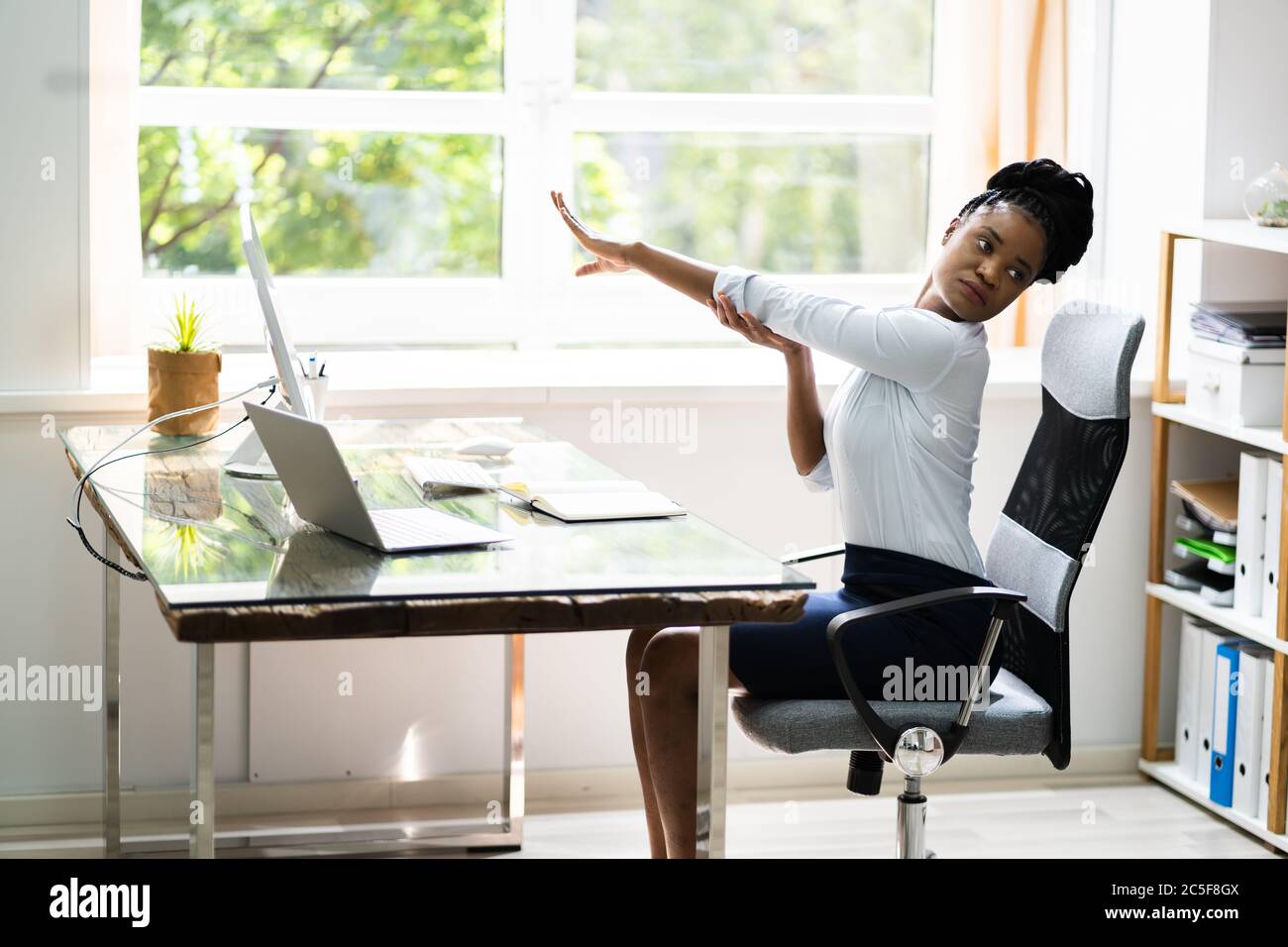 Smart Speaker Voice Assistant And Music Listening Stock Photo - Alamy