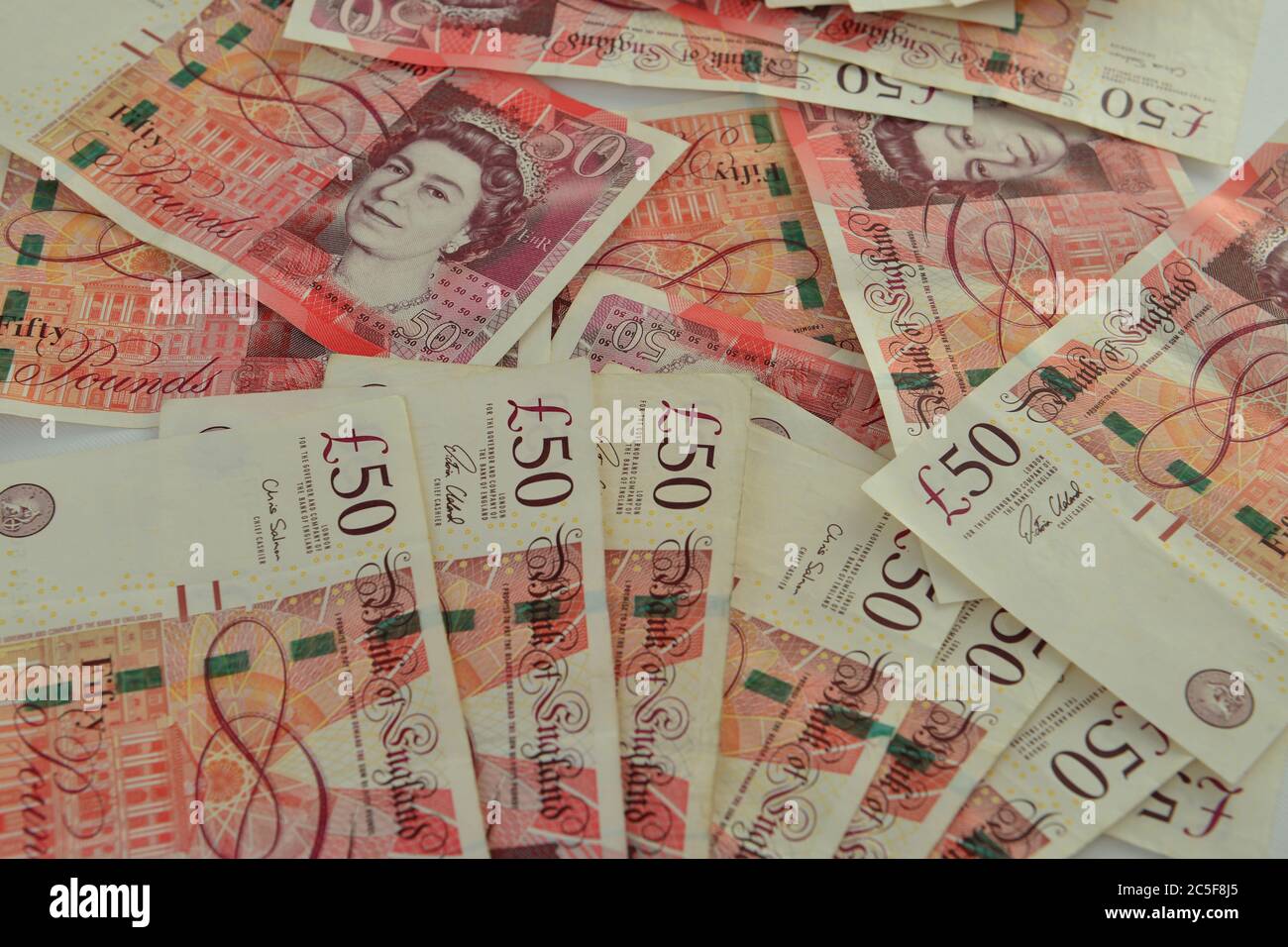 British money Fifty pound note on a white background Stock Photo - Alamy