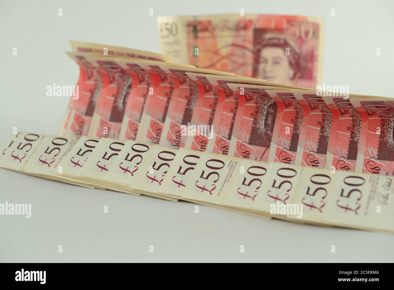 British money Fifty pound note on a white background Stock Photo - Alamy