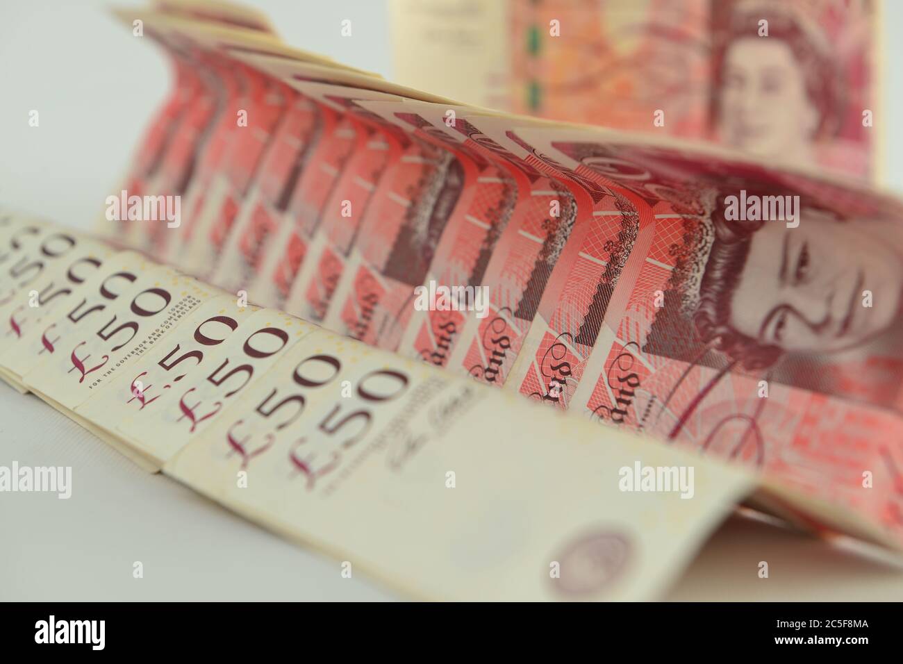 British money Fifty pound note on a white background Stock Photo - Alamy