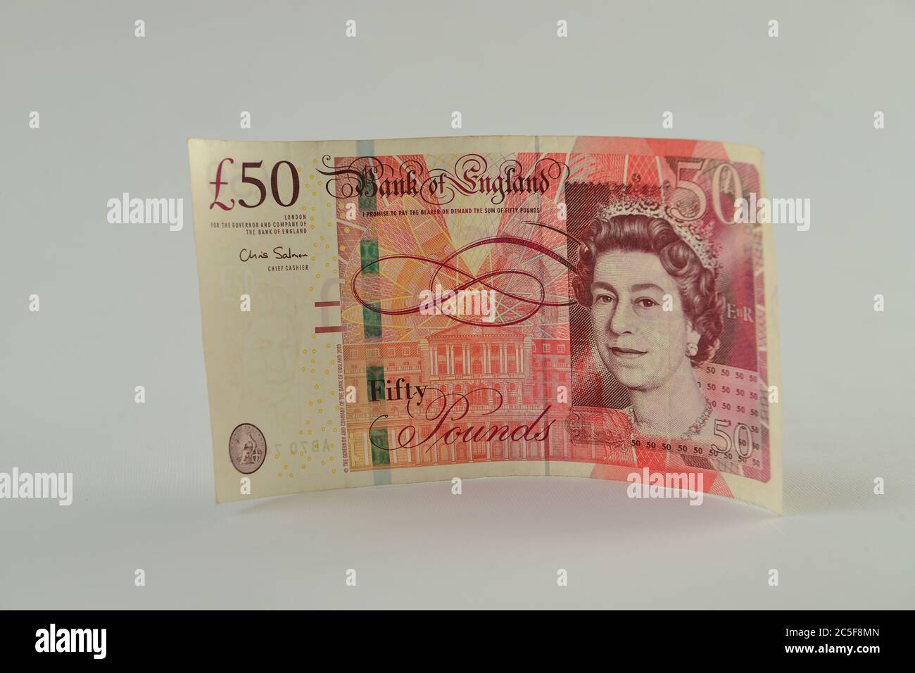 British money Fifty pound note on a white background Stock Photo - Alamy