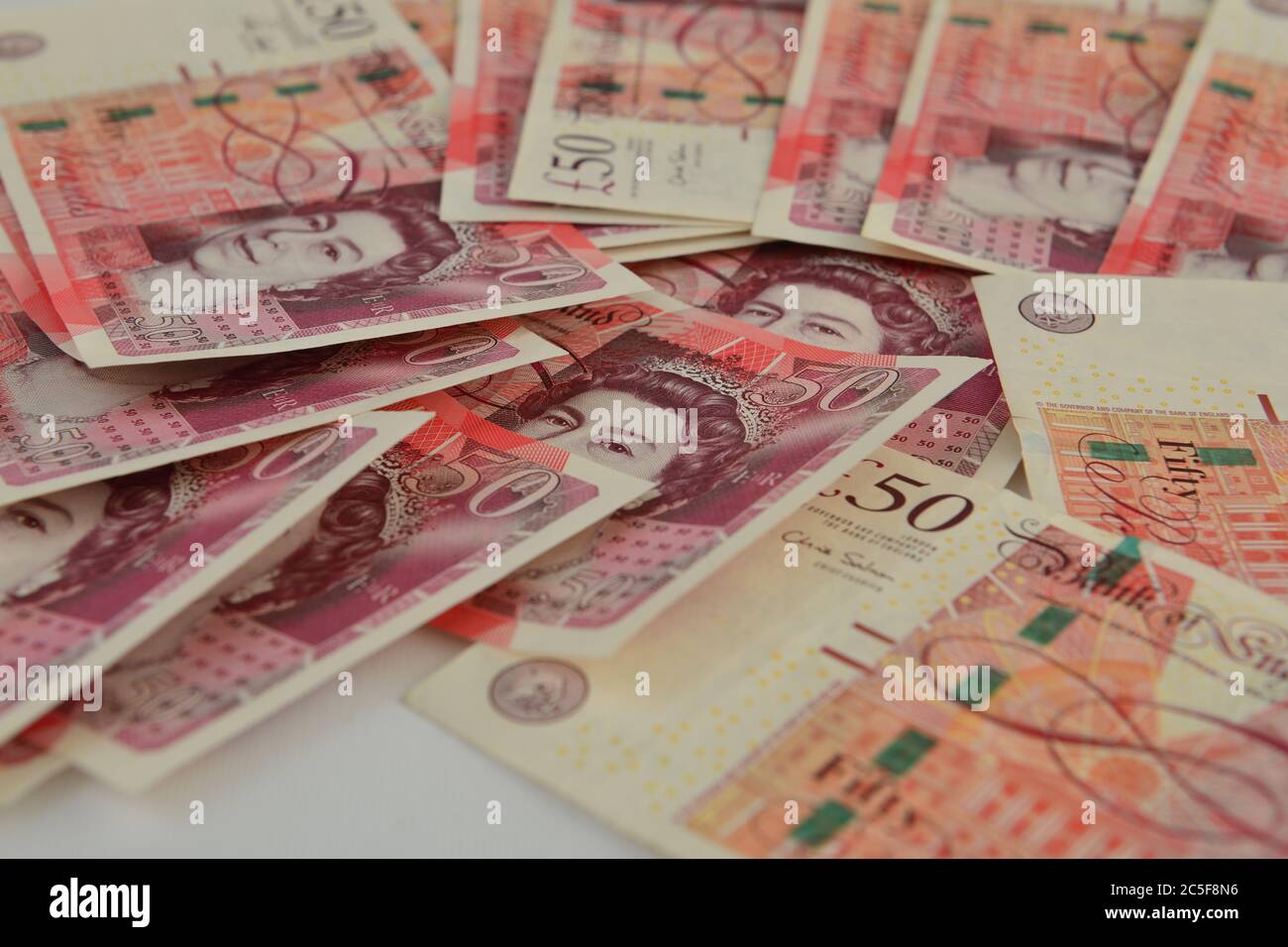 British money Fifty pound note on a white background Stock Photo - Alamy