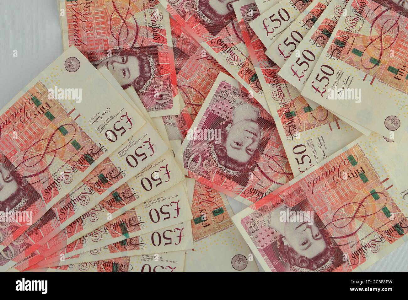 British money Fifty pound note on a white background Stock Photo - Alamy