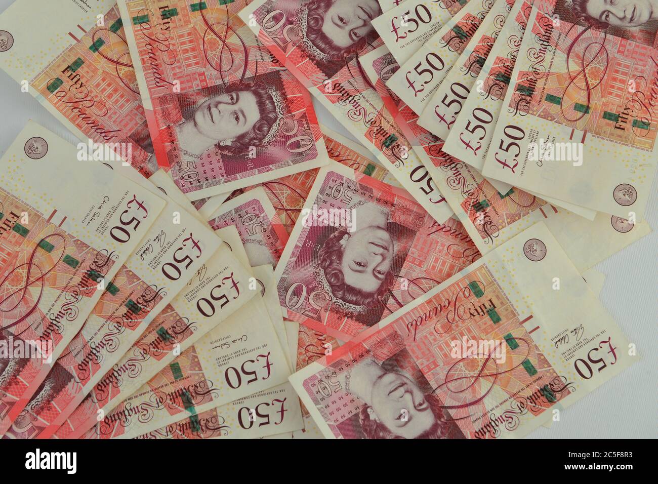 British money Fifty pound note on a white background Stock Photo - Alamy