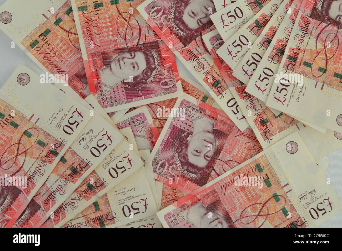 British money Fifty pound note on a white background Stock Photo - Alamy