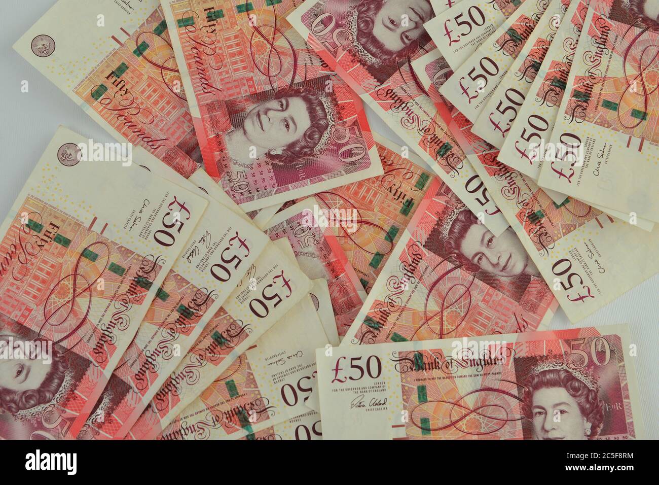 British money Fifty pound note on a white background Stock Photo - Alamy
