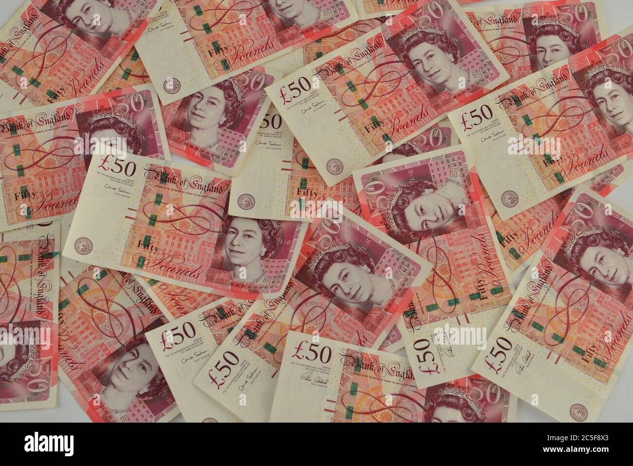 British money Fifty pound note on a white background Stock Photo - Alamy