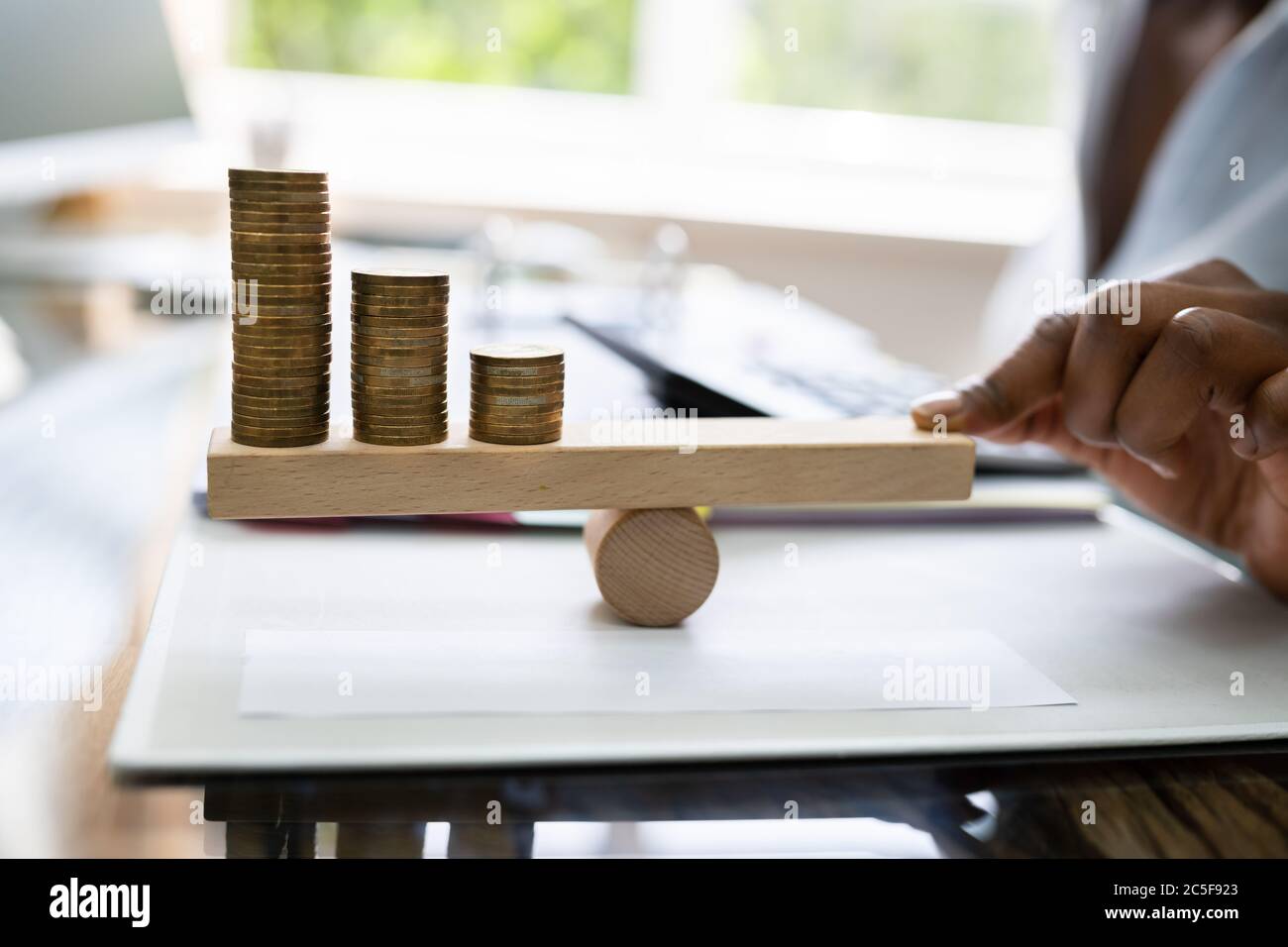 African American Financial Saving Balance And Stacked Coins Stock Photo ...