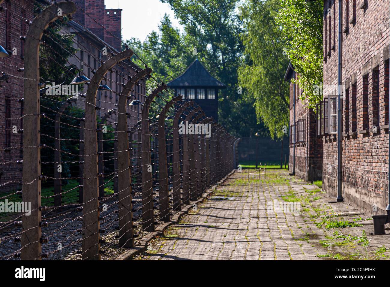Electric and barbed wire fence in the Concentration Camp Auschwitz ...