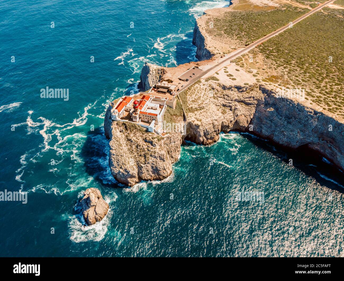 Aerial view, lighthouse on the cliffs, Saint Vincent Cape, Sagres ...