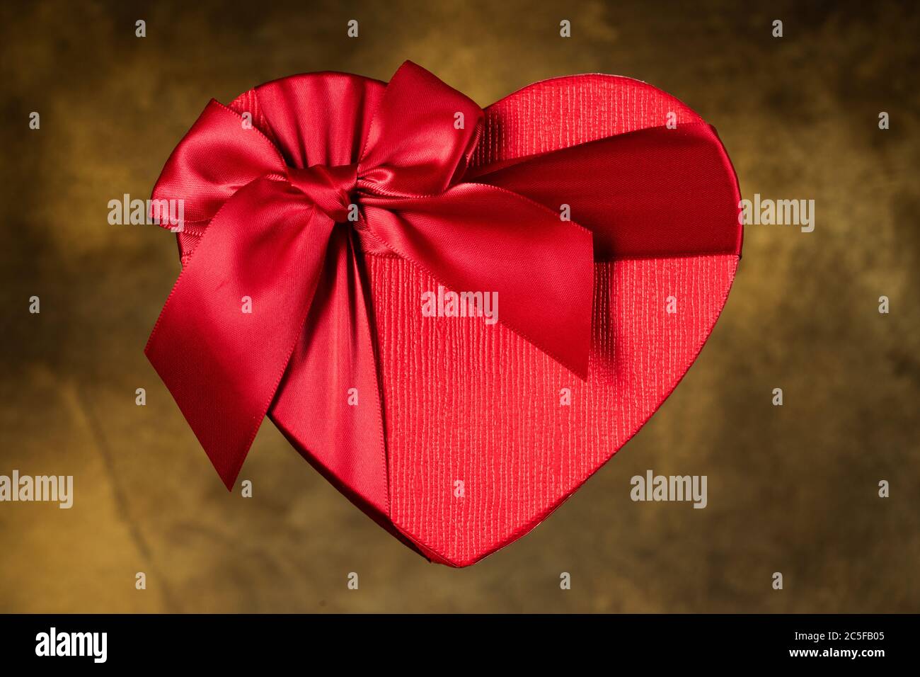 Red heart box on vintage background Stock Photo - Alamy