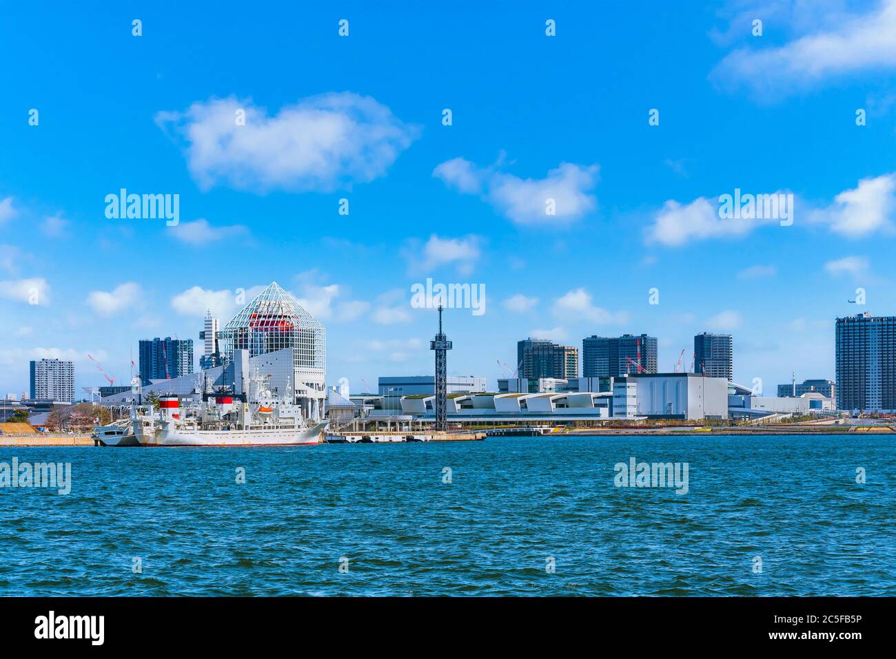 tokyo, japan - april 04 2020: Seascape of ship moored at Harumi ...