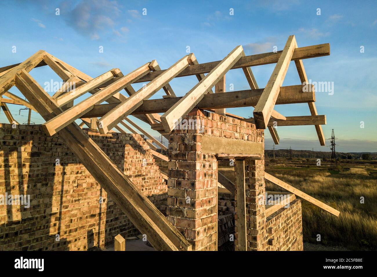 Private residential house with wooden roof frame structure under ...