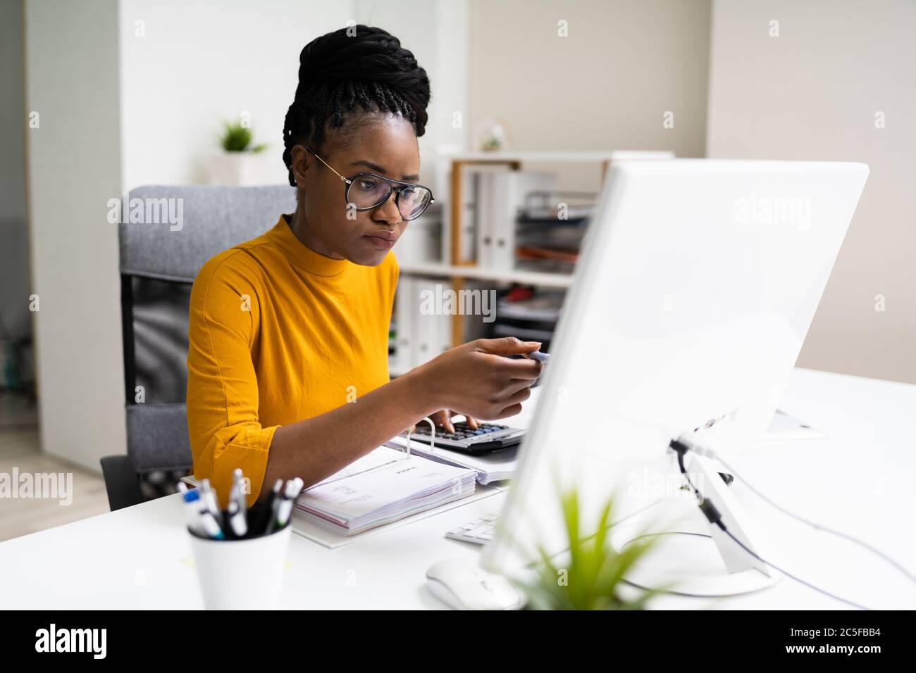 Accounting office hi-res stock photography and images - Alamy
