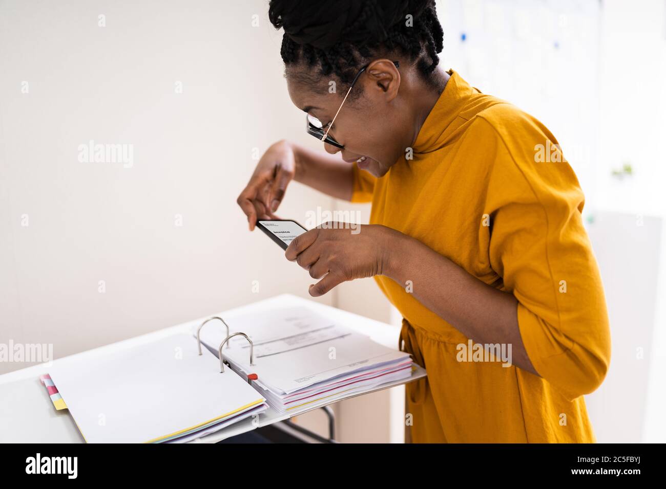 Women taking paper hi-res stock photography and images - Alamy