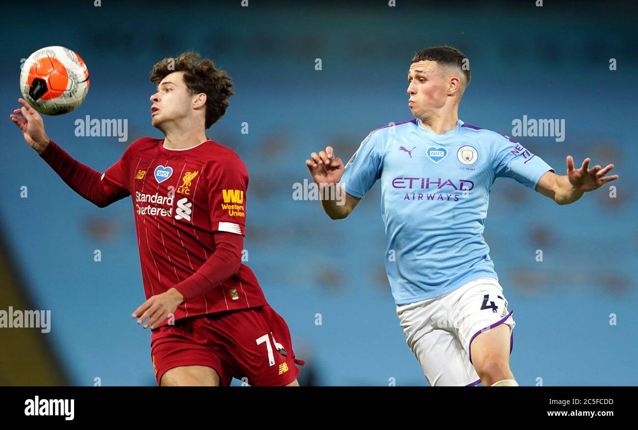 Liverpool's Neco Williams (left) and Manchester City's Phil Foden ...