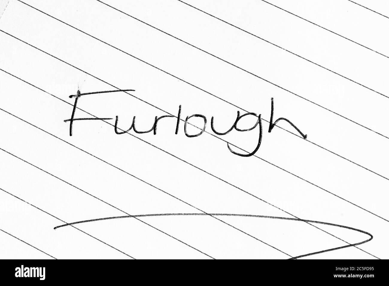 ‘Furlough’ written on lined paper Stock Photo - Alamy