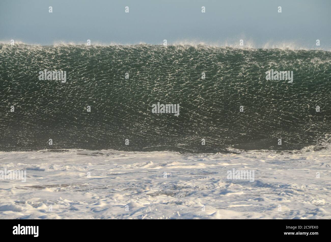 Big Blue Wave Breaks in the Atlantic Ocean Stock Photo - Alamy