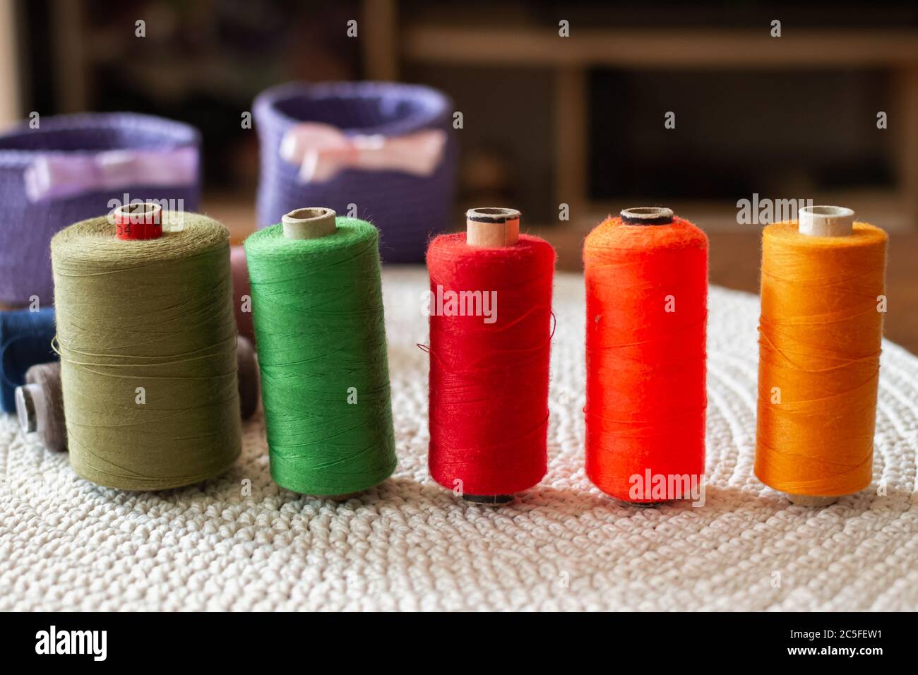 Line up colorful threads for sewing Stock Photo - Alamy