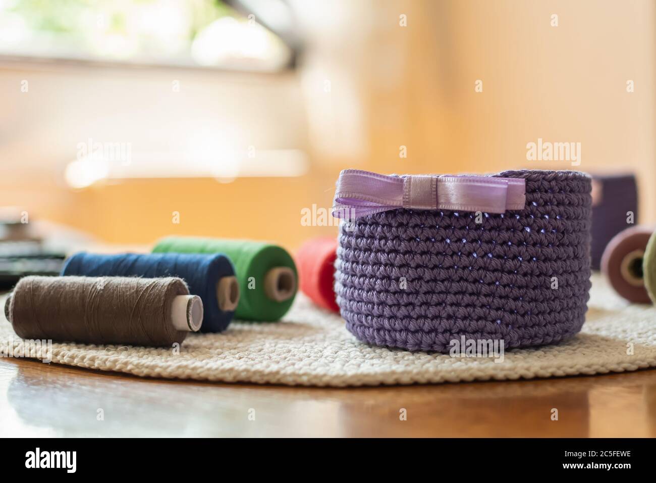 Little red thread hi-res stock photography and images - Alamy