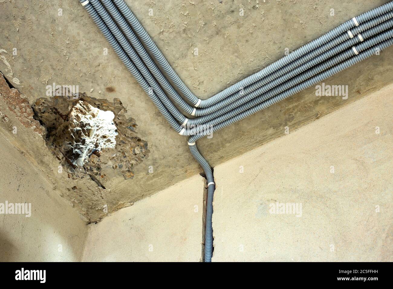 Electricity cables hanging on construction hi-res stock photography and ...