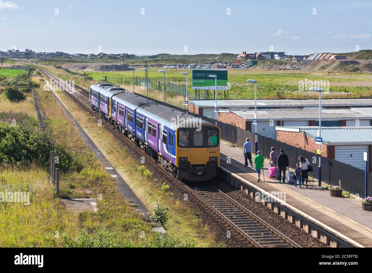 Northern rail class 150 sprinter train 150149 + class 142 pacer calling at Squires Gate railway ...
