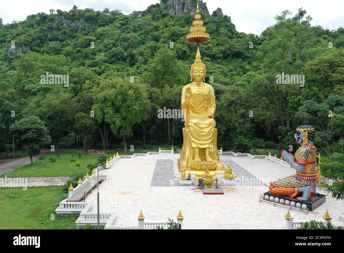 Budda statue at the bottom of the mountain in Rathaburi Thailandc Stock ...