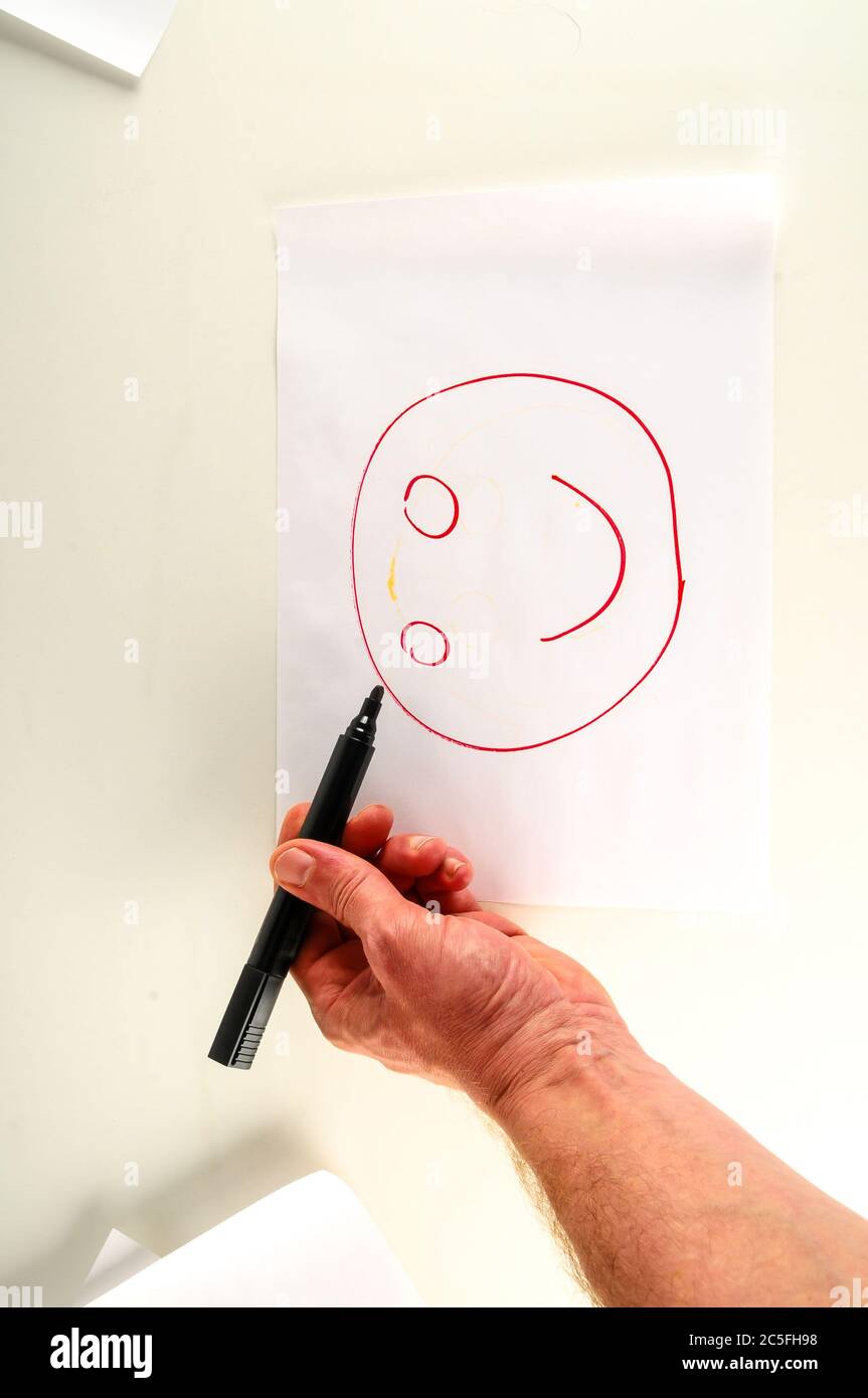 Close-up of sheet with drawing face Object on a White Background Stock ...