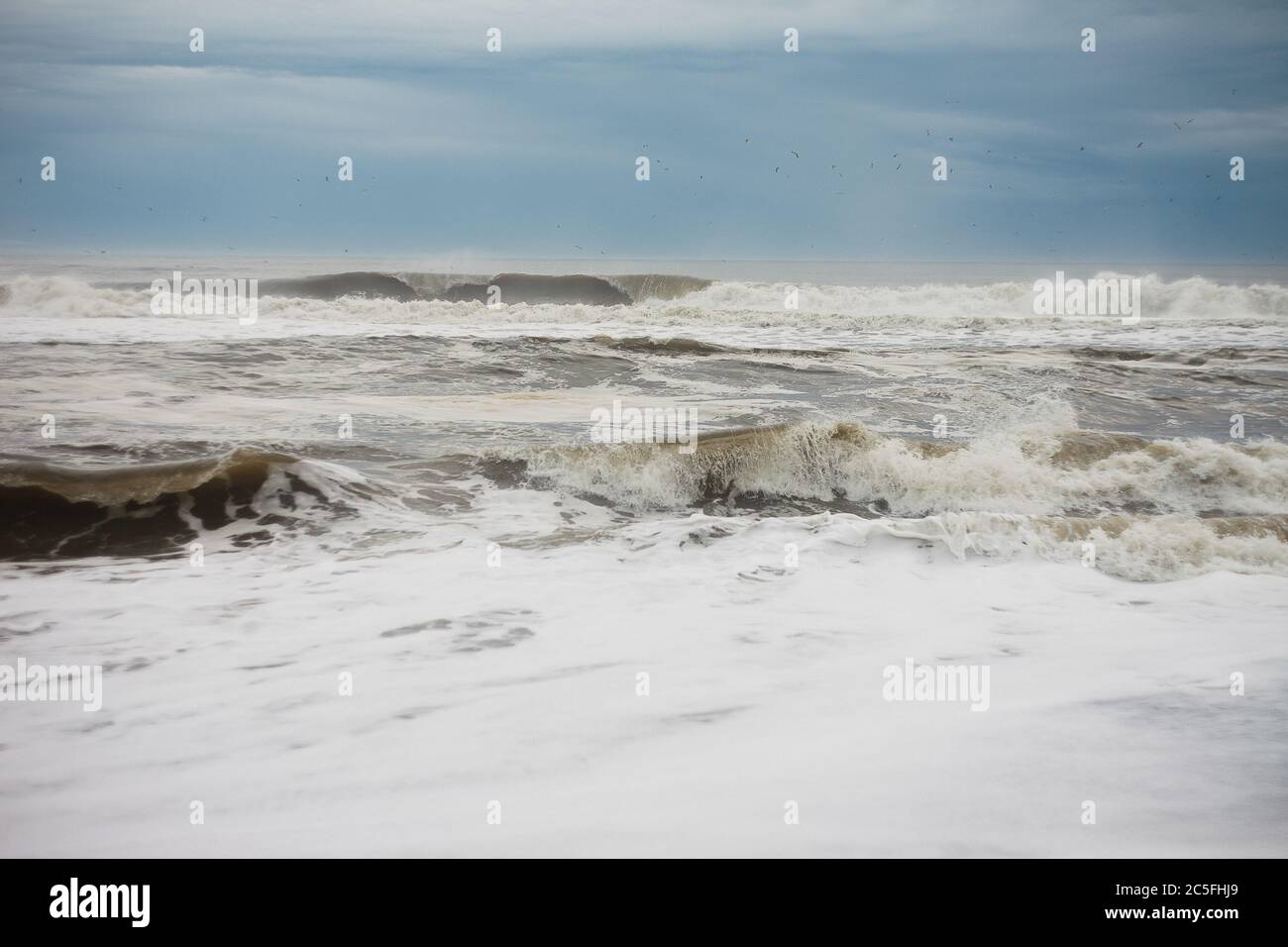 Waves Crashing on the Beach Stock Photo - Alamy