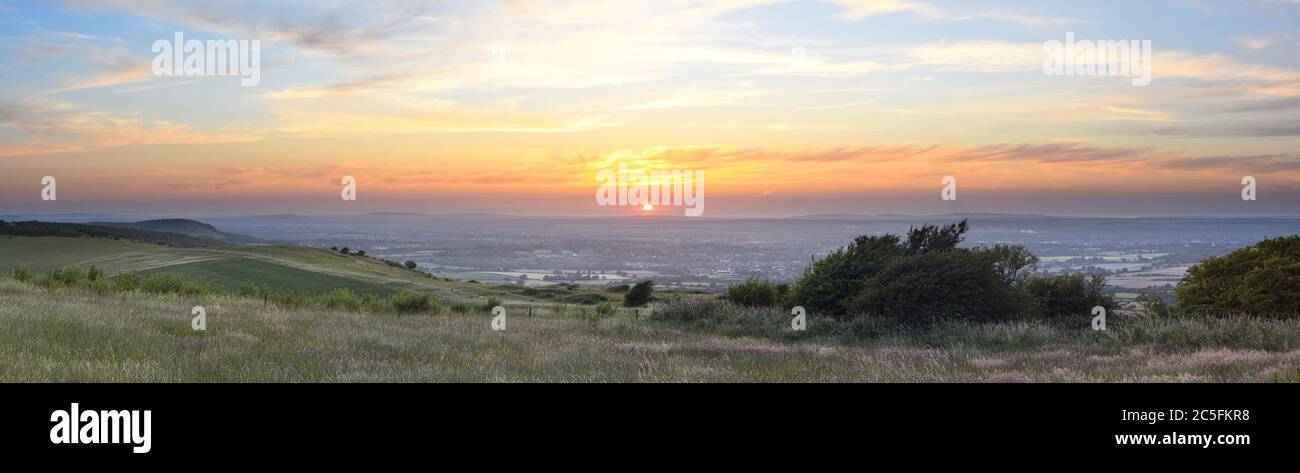 Panoramic view from Ditchling Beacon during sunset, with a dramatic ...