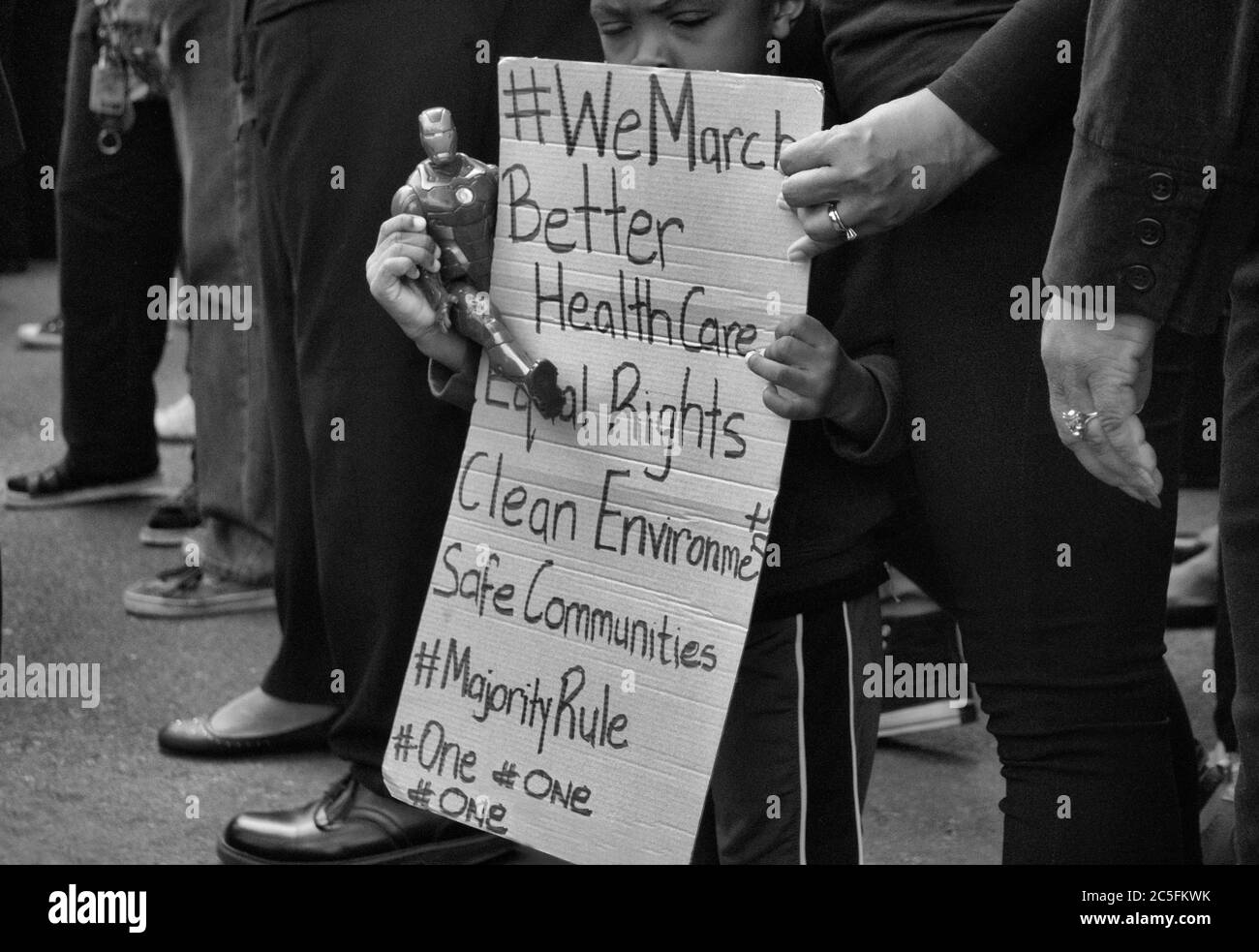 Young black boy holds protest sign asking for equal rights for black ...