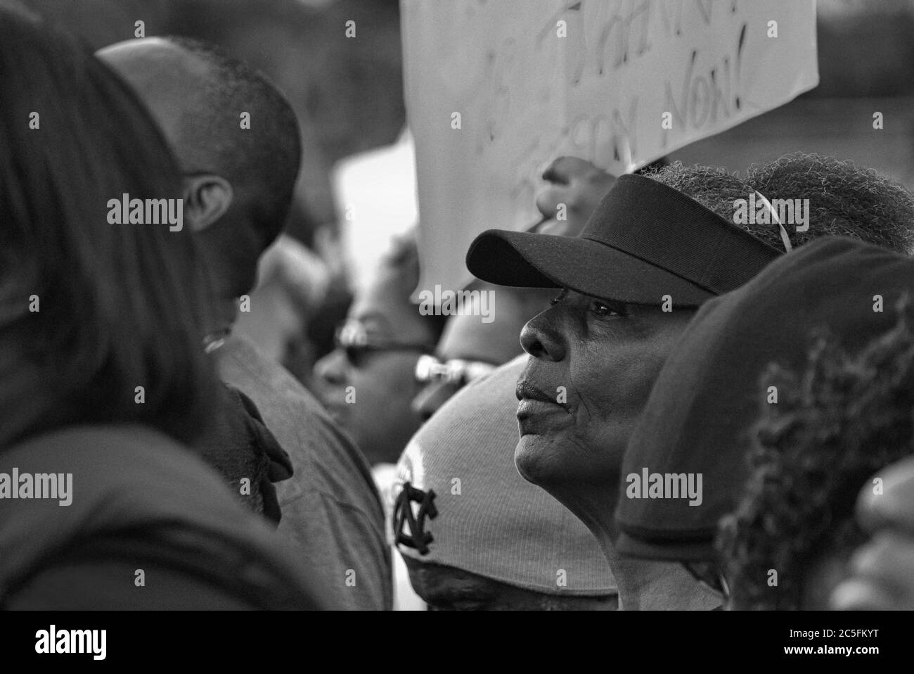 Young black boy holds protest sign asking for equal rights for black ...