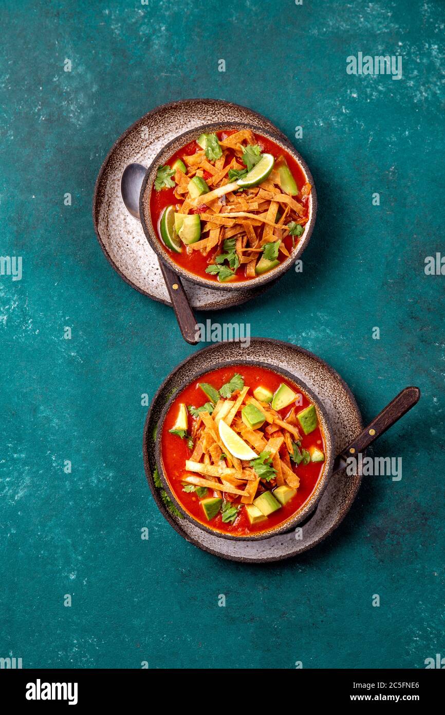 Aztec soup. Mexican sopa azteca with fried tortilla . Top view Stock ...