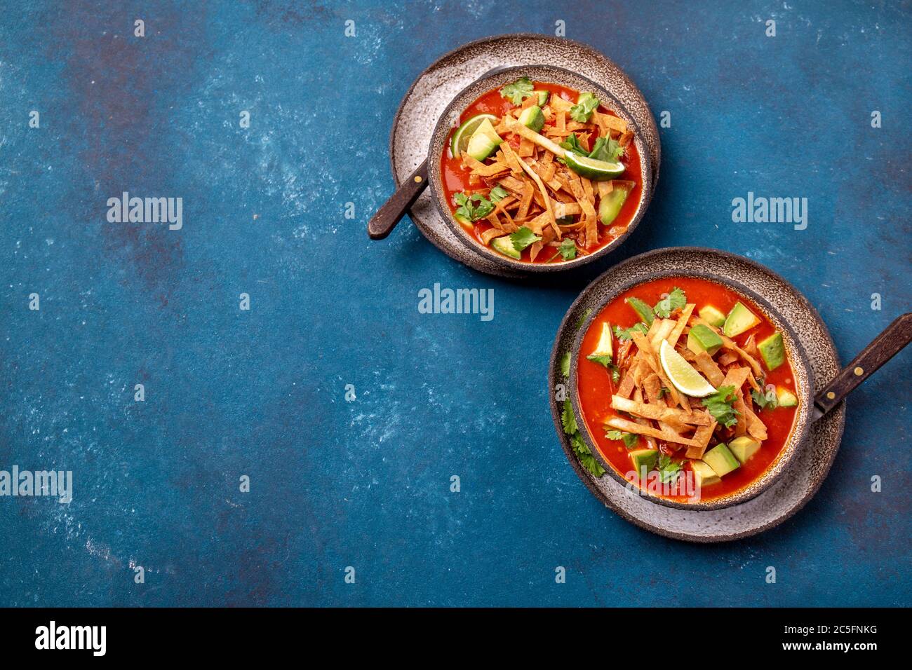 Aztec soup. Mexican sopa azteca with fried tortilla . Top view Stock ...