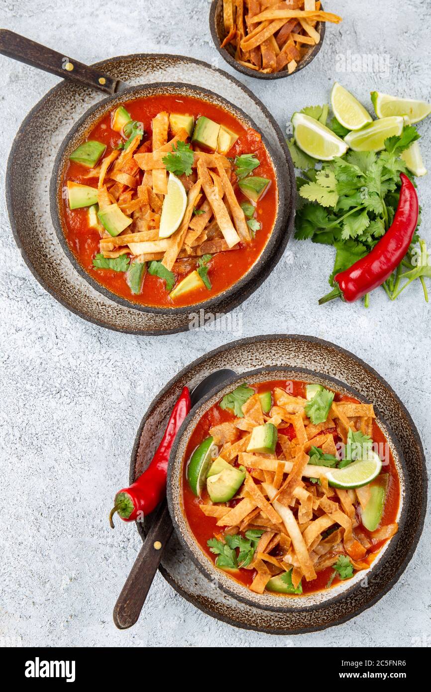Aztec soup. Mexican sopa azteca with fried tortilla . Top view Stock ...