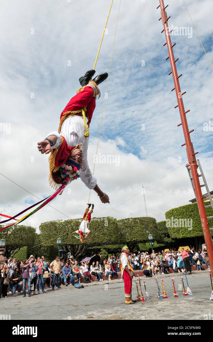The famous Voladores de Papantla, the Papantla Flyers, perform their ...