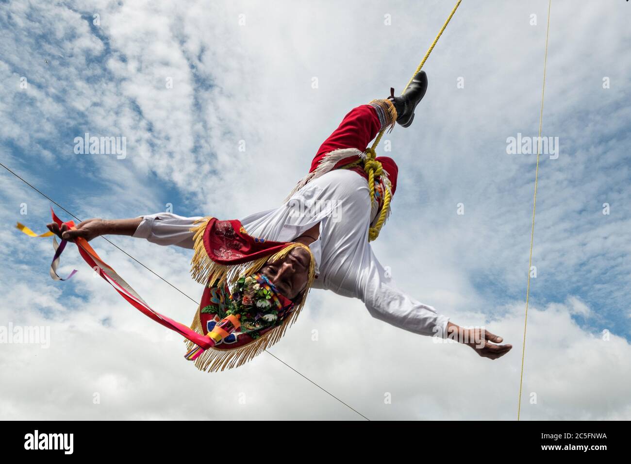 The famous Voladores de Papantla, the Papantla Flyers, perform their ...