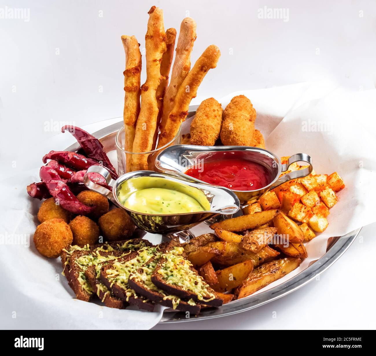 Large plate a wide selection snacks for beer served Stock Photo - Alamy