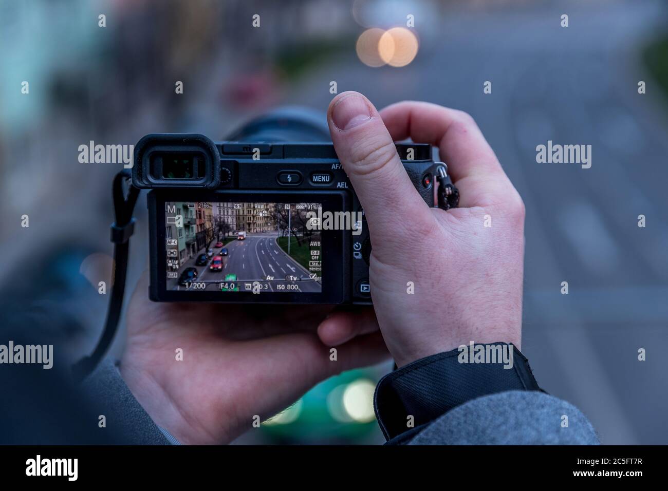 Taking pictures with camera through another camera and lens Stock Photo ...